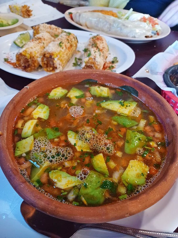 This isn't just soup; it's a warm hug in a clay bowl. Avocado chunks floating in savory broth create comfort food that transcends language barriers.