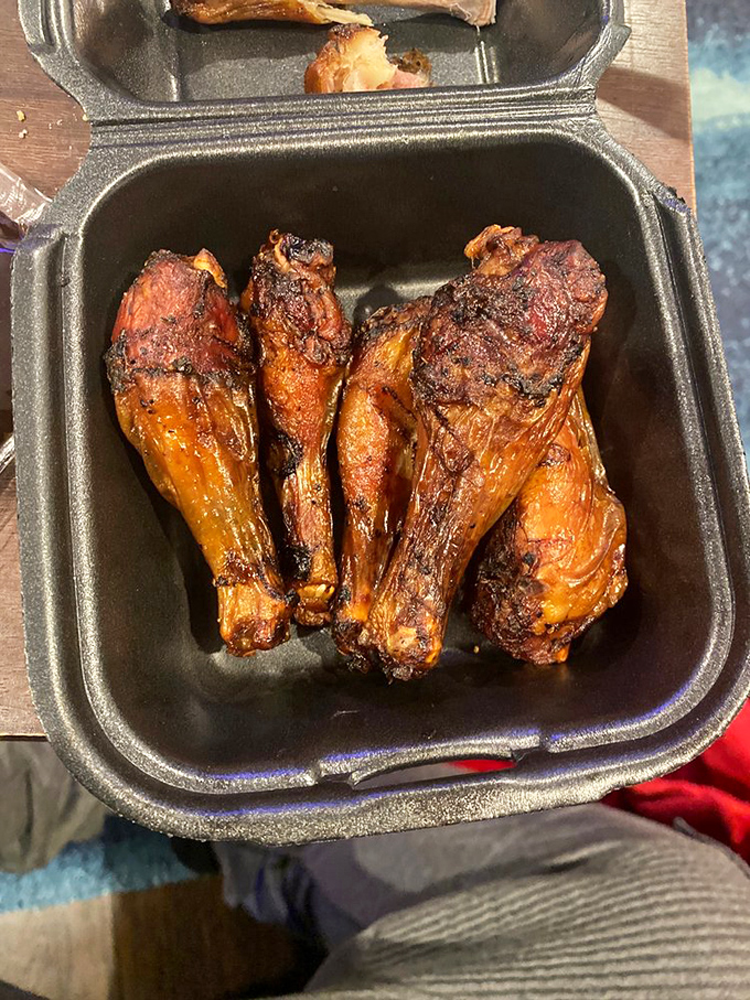 Golden chicken legs with that beautiful barbecue bark that promises juicy, smoky perfection in every bite.