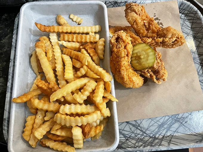 Crinkle-cut fries that zigzag through memories of childhood alongside chicken tenders that grew up and went to culinary finishing school.