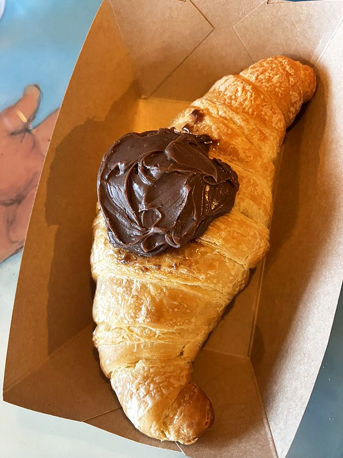 This chocolate croissant doesn't just flake&mdash;it shatters into buttery shards that make you temporarily forget all your adult responsibilities.