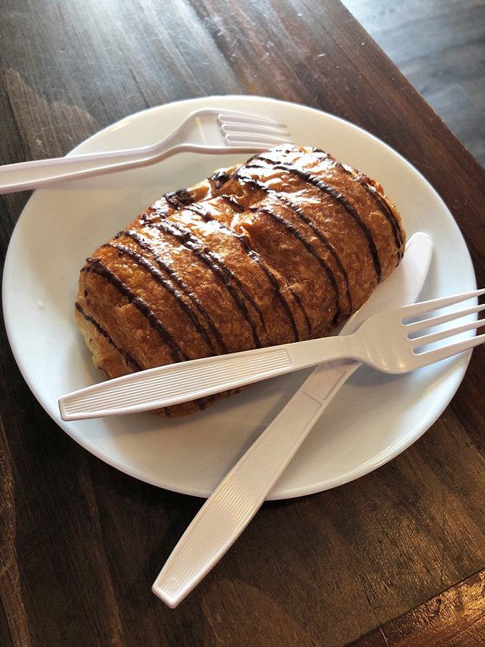 This chocolate-drizzled pastry isn't just breakfast&mdash;it's justification for getting out of bed. Flaky, rich, and worth every calorie.