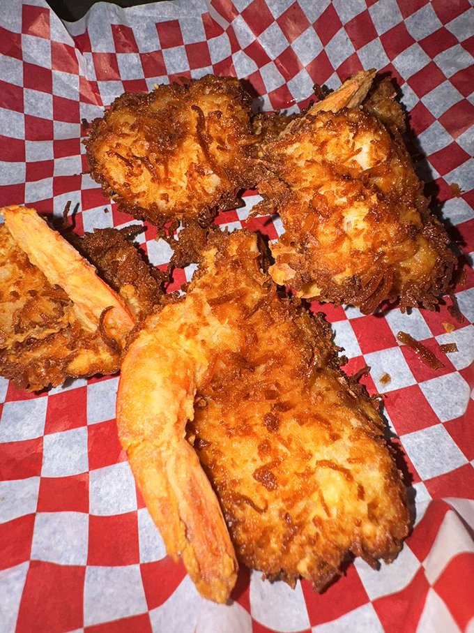 Coconut shrimp that delivers the satisfying crunch you hear in your dreams. Red checkered paper signals you're about to experience unpretentious deliciousness.