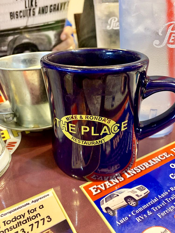 That deep blue mug isn't just holding coffee&mdash;it's holding the solution to all your morning problems. The placemats contain the secrets of Flagstaff.
