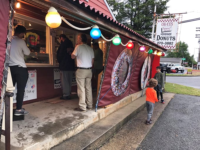Family traditions are born at places like Ob-Co's. That little boy is learning the important life skill of proper donut selection&mdash;parenting done right.