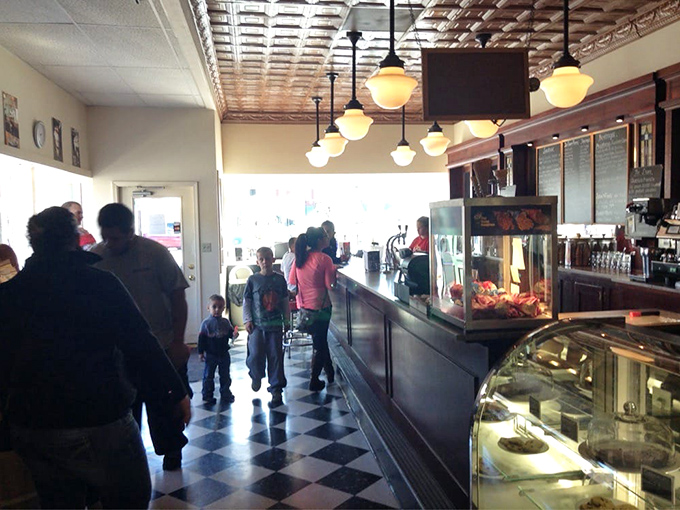 The hustle at the counter shows the timeless appeal—families have been lining up for these sweet treasures since Truman was behind the counter, not in history books.