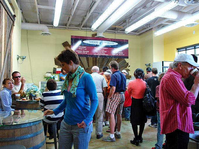 Morning rush at Whoo's&mdash;where strangers become friends while waiting for their fix. The universal language of "I need that donut" transcends all barriers.