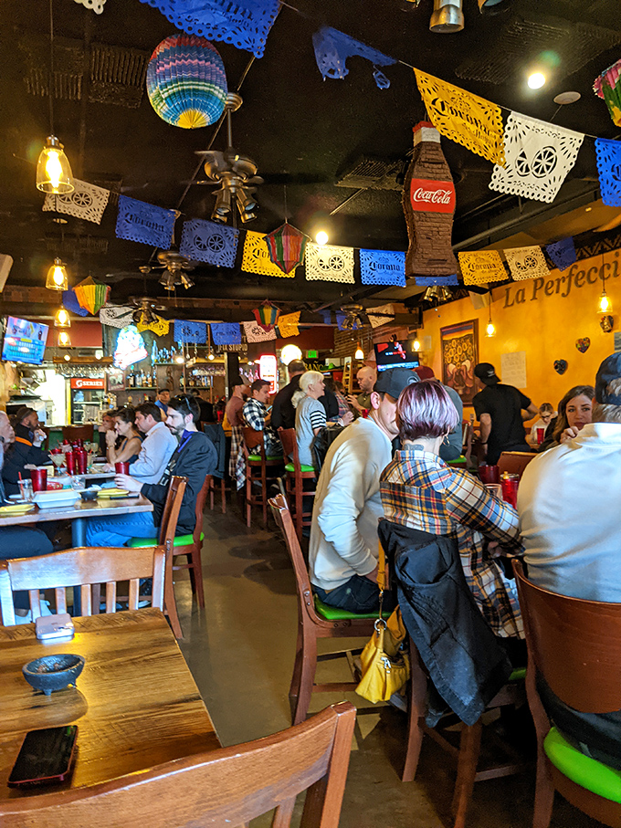 Even on a busy night, D'Corazon maintains its welcoming charm with colorful papel picado flags waving hello from the ceiling.
