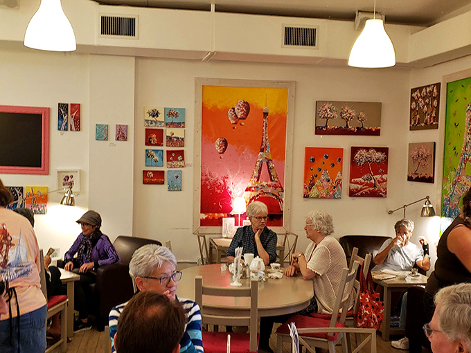 A gathering of the wise&mdash;locals who've discovered that good conversation pairs perfectly with French pastry and unhurried afternoons.