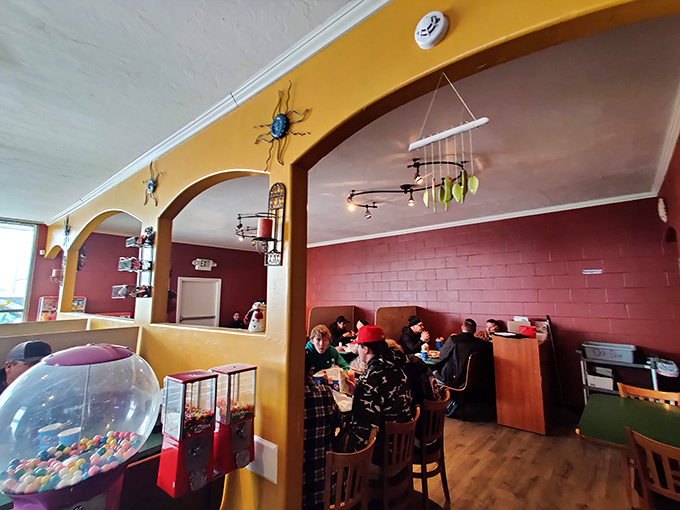 Where locals gather for food that tastes like someone's grandmother is in the kitchen, guarding recipes with loving vigilance.