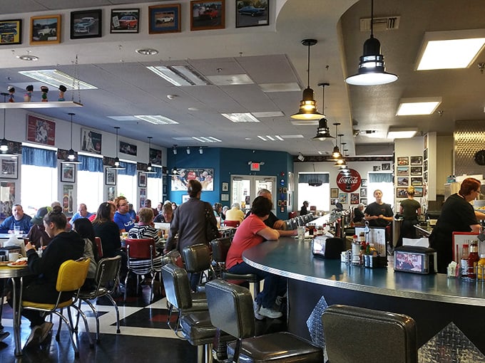 The counter buzz at breakfast&mdash;where strangers become temporary neighbors united by coffee and the promise of pancakes.