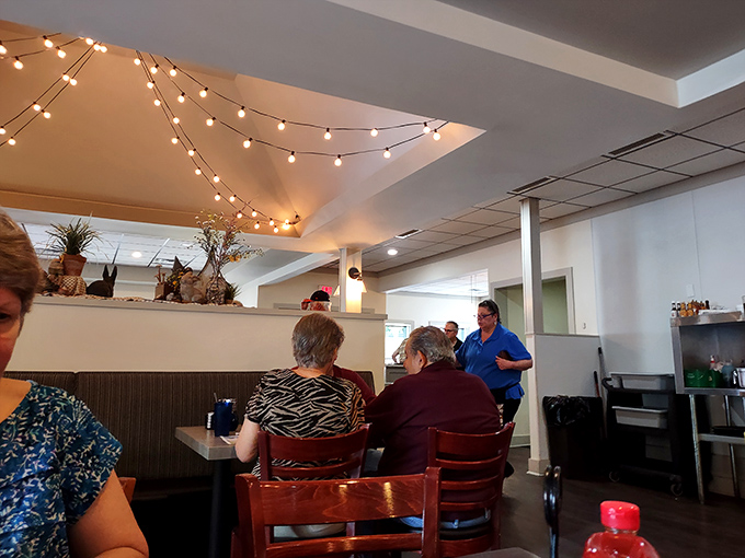 String lights add a touch of whimsy to this gathering spot where locals and visitors alike bond over the universal language of breakfast.