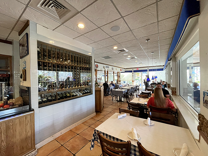 The dining room buzzes with the energy of shared meals and stories. Those wine racks aren't decoration&mdash;they're liquid anticipation.