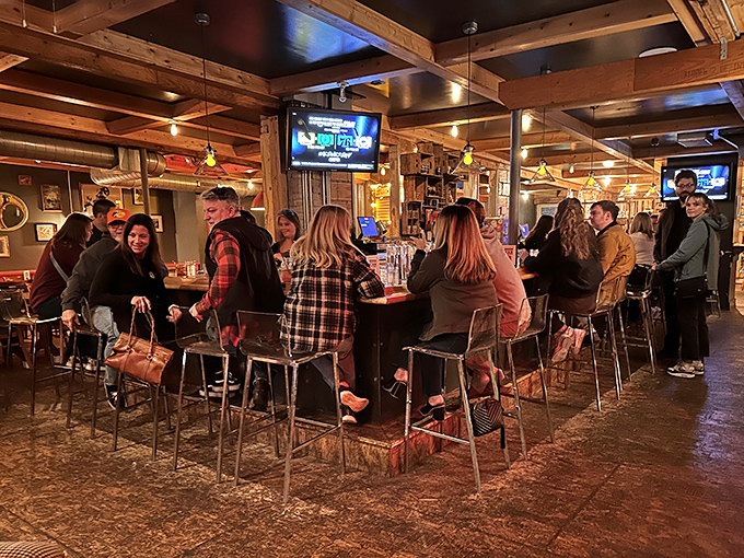The bar scene: where strangers become friends over craft beers and barbecue debates. Notice nobody's looking at their phones? That's the Woodshop magic.