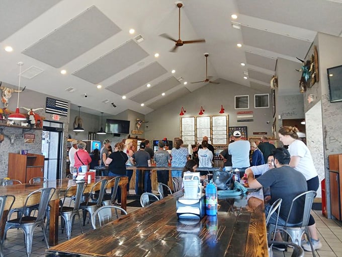 The line forms to the right, the anticipation builds to the left. These folks aren't just waiting—they're preparing for a religious experience.