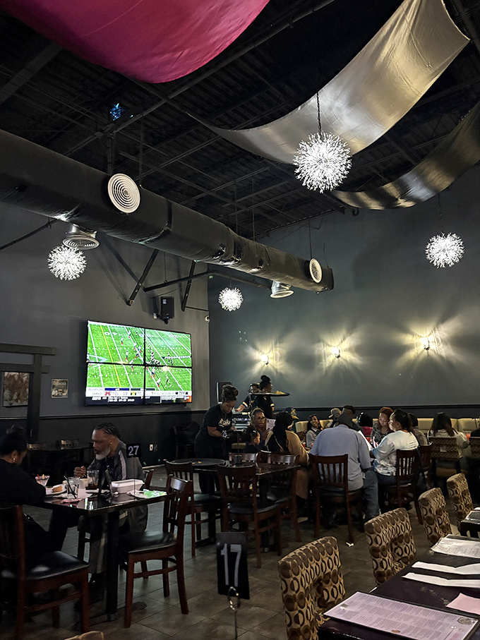 Game day at Boss Queens means you don't have to choose between great food and catching the action&mdash;those ceiling drapes aren't just decorative, they're conversation starters.