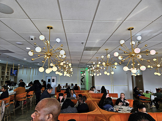 The weekend breakfast crowd—a beautiful symphony of humanity united by the universal language of "pass the hot sauce, please."