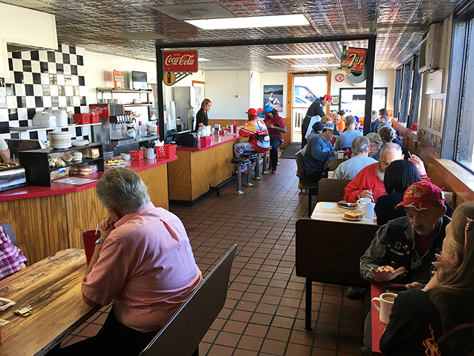 Where strangers become neighbors over coffee refills and hash browns. The true Kansas City breakfast club meets here daily.