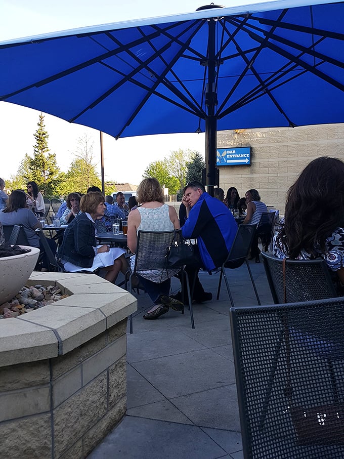 The outdoor patio&mdash;where Kansas summer evenings transform from "too hot" to "just right" under those signature blue umbrellas.
