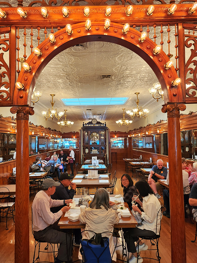 Where strangers become neighbors under the glow of antique lights. This isn't just dining &ndash; it's community building, one sundae at a time.