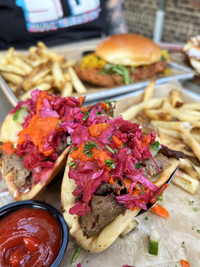 A sandwich that bridges continents: tender meat, vibrant slaw, and bread that's somehow both sturdy enough to hold it all and soft enough to love.