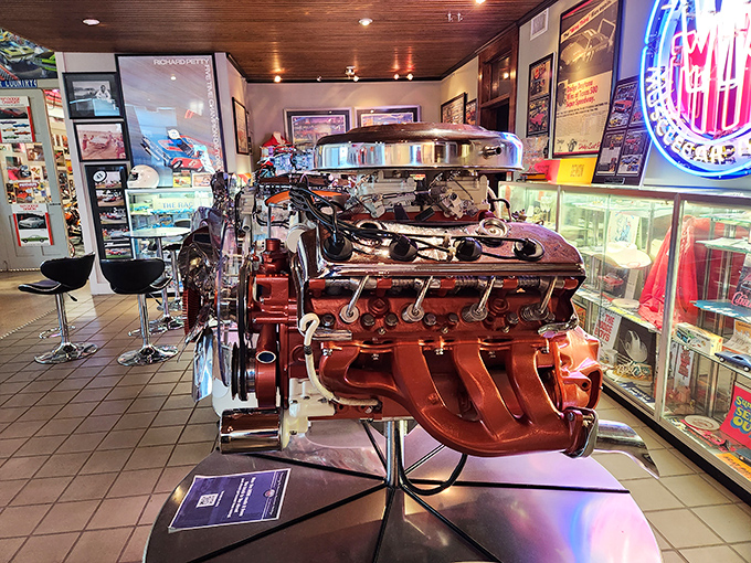 This exposed engine display lets you appreciate the mechanical poetry that made these cars legends of American horsepower.