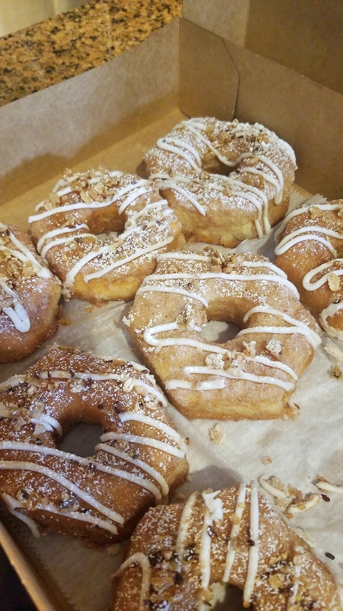 These aren't just donuts—they're edible architecture. The drizzle, the crumble, the perfect golden dough—it's breakfast engineering at its finest.