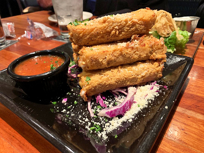 Fried cheese sticks that put all others to shame. Remember when mom said not to play with your food? She never saw these stretchy beauties.