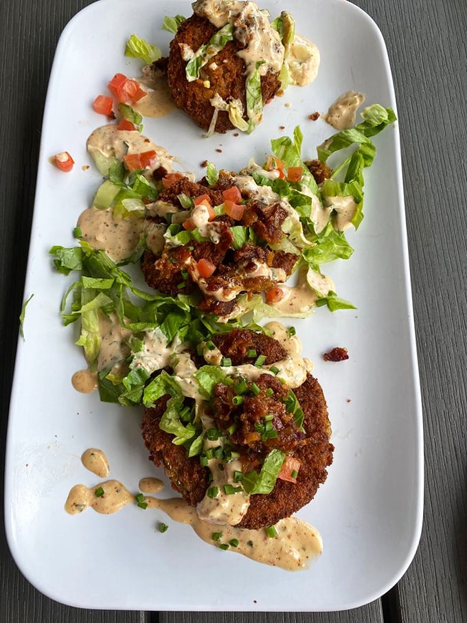 These aren't just fried green tomatoes&mdash;they're Southern tradition elevated with a creamy sauce that makes vegetables feel like an indulgence.