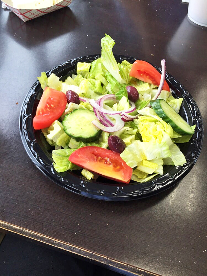 A proper Greek salad with no unnecessary frills &ndash; just crisp vegetables, kalamata olives, and feta cheese that wasn't crumbled by some impatient sous chef.