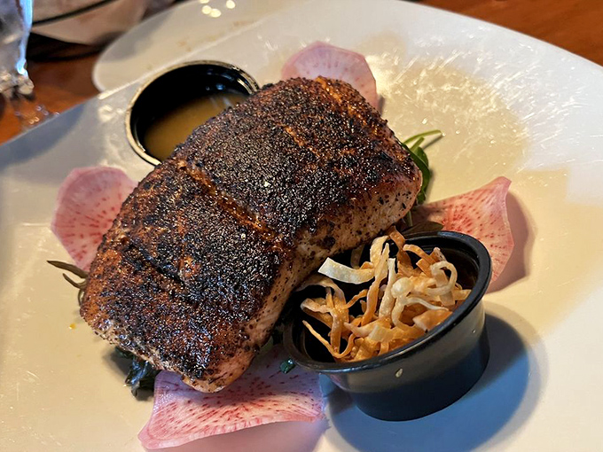 This blackened salmon brings the perfect amount of spice to the party, surrounded by fresh vegetables like colorful backup dancers.