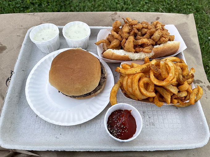 The holy trinity of Jumpin' Jack's: burger, onion rings, and clam strips. This tray should come with a warning: "May induce food coma."