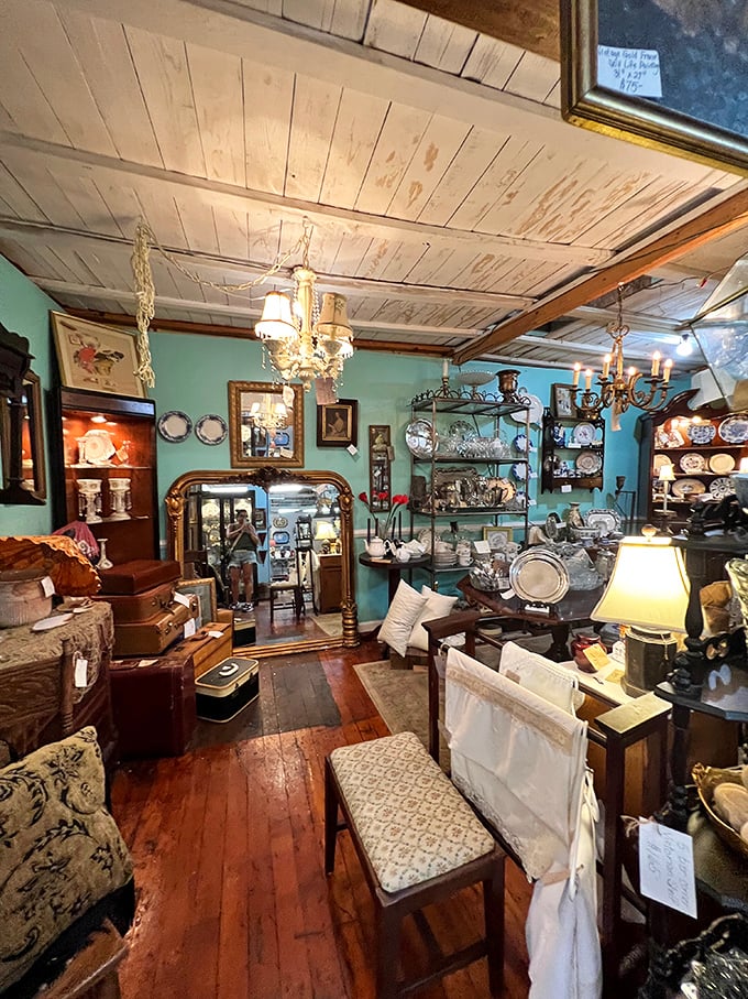 The perfect living room that never was, but could be. That teal wall isn't just a backdrop&mdash;it's an invitation to reimagine your space.