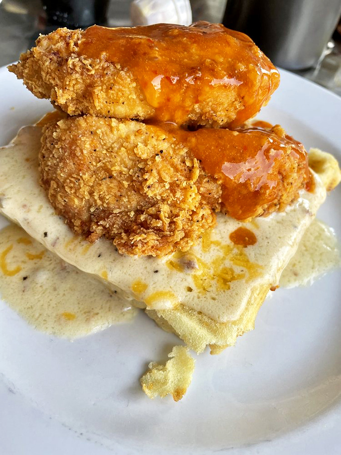 Hot chicken meets waffle in a sweet-spicy liaison that proves some of the best relationships are built on delicious contradictions.