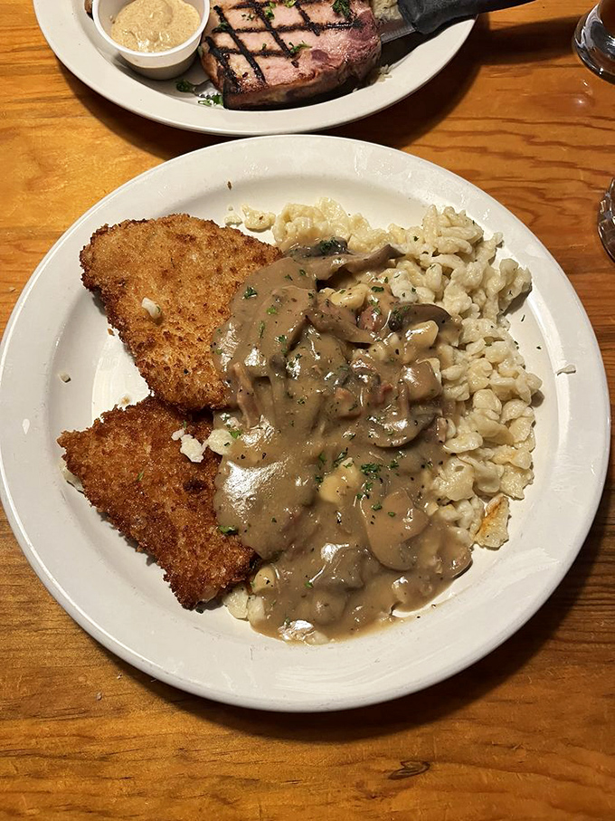 J&auml;gerschnitzel with mushroom sauce so good you'll want to bathe in it. The sp&auml;tzle on the side is the perfect dance partner.