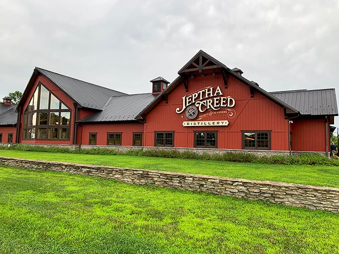 Jeptha Creed Distillery combines rustic charm with Kentucky's bourbon heritage. The barn-red exterior houses golden treasures that have made this region world-famous.