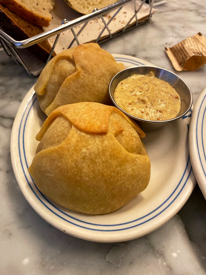 Knishes that look like they're auditioning for a food magazine cover &ndash; golden, plump, and ready to reveal their savory secrets.