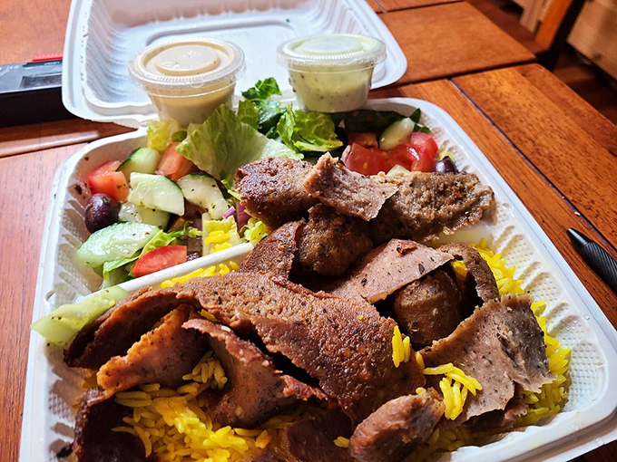 The takeout container barely contains the generosity of this shawarma plate. Proof that good things come in styrofoam packages.