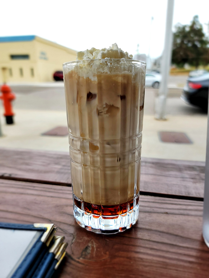 Layers of flavor in a glass that's part coffee, part dessert, part morning motivation. The bottom syrup is the surprise twist in this caffeinated story.