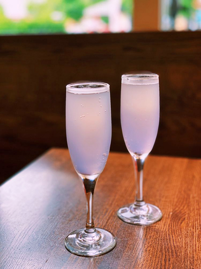 Two elegant flutes of bubbly standing at attention, ready to transform your ordinary Tuesday into a celebration worthy of weekend proportions.
