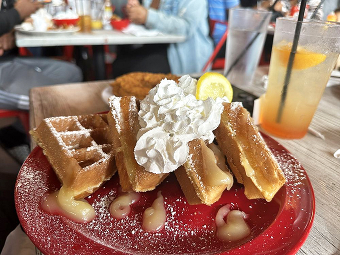 What happens when waffles meet dessert? This whipped cream-topped creation answers that question deliciously. Resistance is futile.