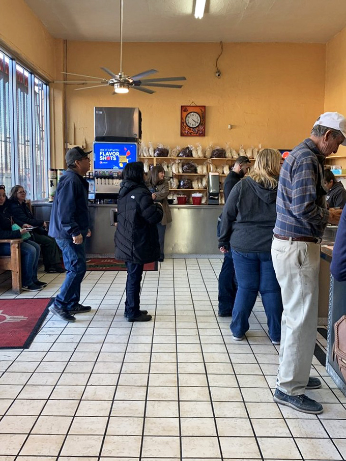 The line of devotees speaks volumes—these folks know that good things come to those who wait, especially when those good things involve handmade sopapillas.