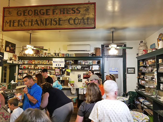 Ice cream brings strangers together in a shared mission. In this crowd, everyone's united by the universal language of "I'll have two scoops, please."