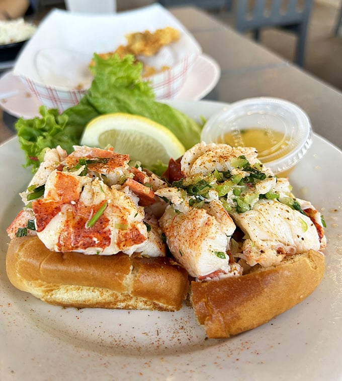 A proper lobster roll that doesn't hide behind fancy ingredients&mdash;just sweet meat, light seasoning, and a perfectly toasted bun.