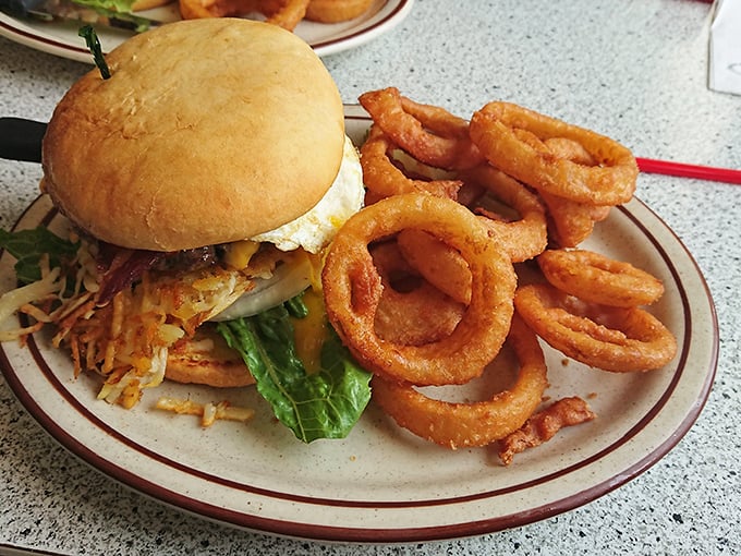 The Malibu Burger's sidekick &ndash; those golden onion rings &ndash; steals the spotlight with a crunch you can hear across the diner. Worth every calorie.