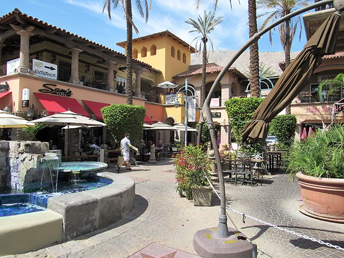 Fountains dance while shoppers browse at Palm Springs' outdoor marketplaces. The sound of water is nature's air conditioning in retail paradise.