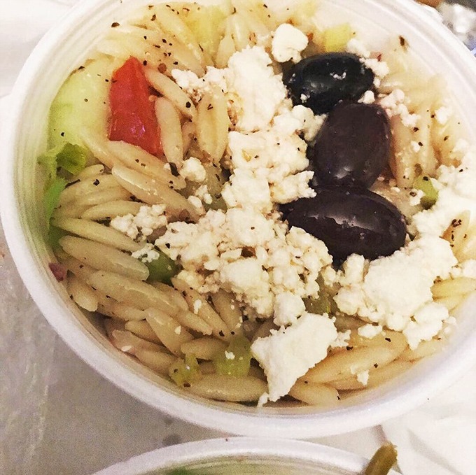 Orzo—the pasta that thinks it's rice—playing the perfect host to olives, feta, and vegetables in this Mediterranean medley.