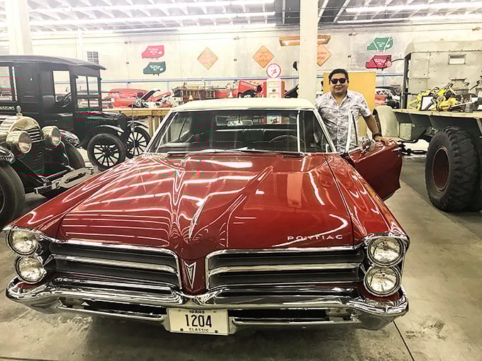 Cherry-red perfection! This gleaming Pontiac represents peak American automotive swagger&mdash;when cars weren't just transportation but rolling statements of personal style and success.