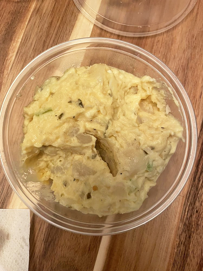 Potato salad that strikes the perfect balance between creamy and chunky – the kind that ends family arguments instead of starting them.