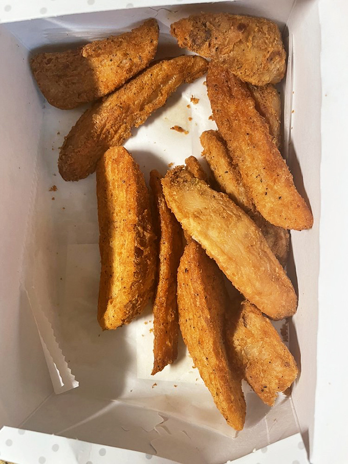 These aren't just potato wedges; they're golden-brown flavor vessels, perfectly seasoned and ready to transport you to carb paradise without a passport.