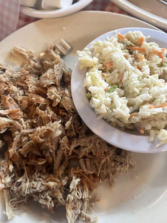 Pulled pork that's spent quality time in the smoker paired with fresh, crunchy coleslaw&mdash;a Southern duet that hits all the right notes.